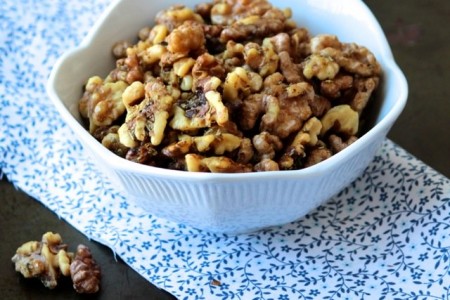 Wonderfully simple and addicting roasted walnuts. Salty, sweet, savory ...